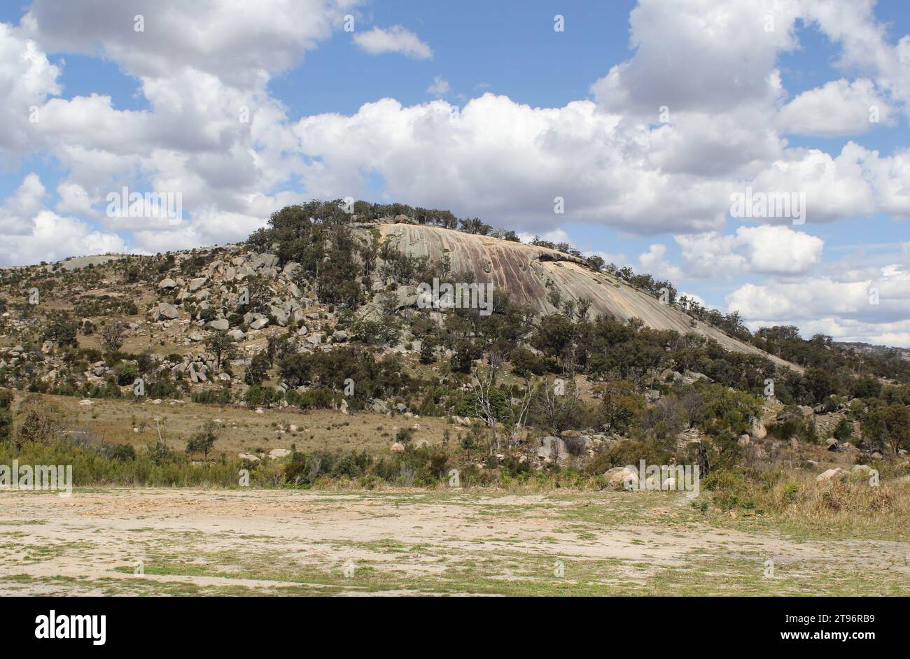 Draining Rock mountain landscape with trees, rocks, sky and clouds near ...
