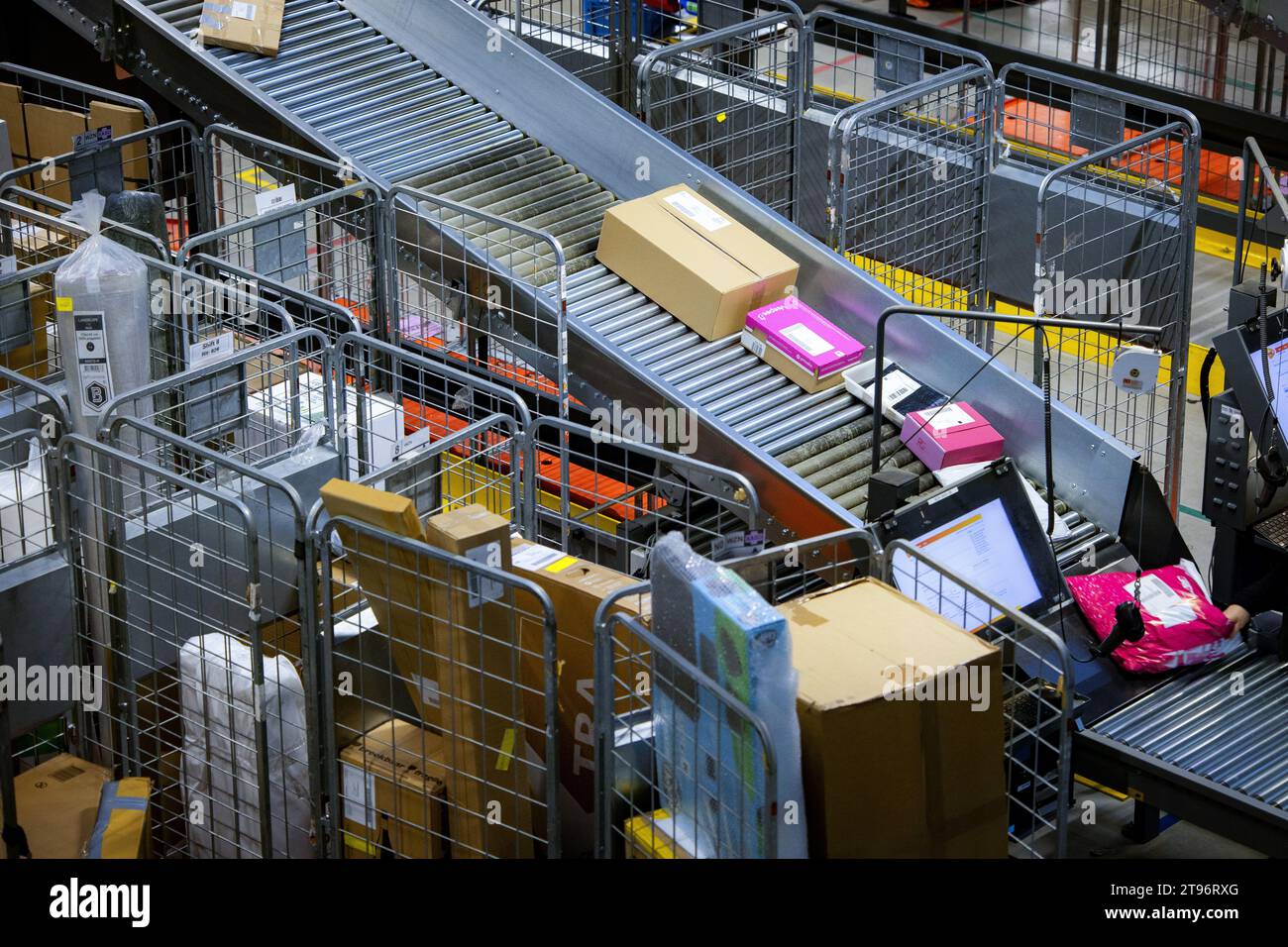 WESTZAAN - Parcels on the conveyor belt in a PostNL parcel sorting ...