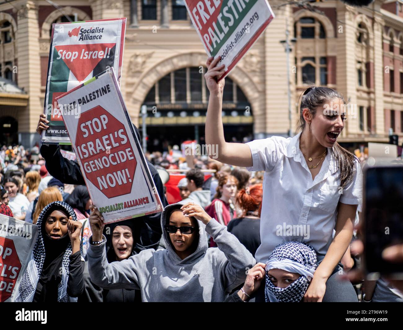 Melbourne, Australia. 23rd Nov, 2023. Student demonstrators hold ...