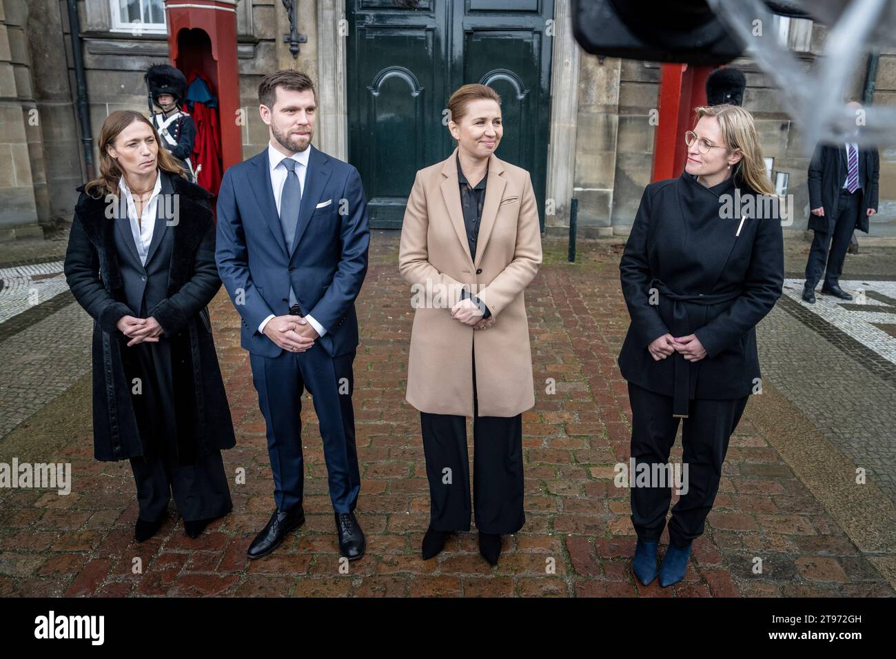 Danish Prime Minister Mette Frederiksen (second from right) presents ...
