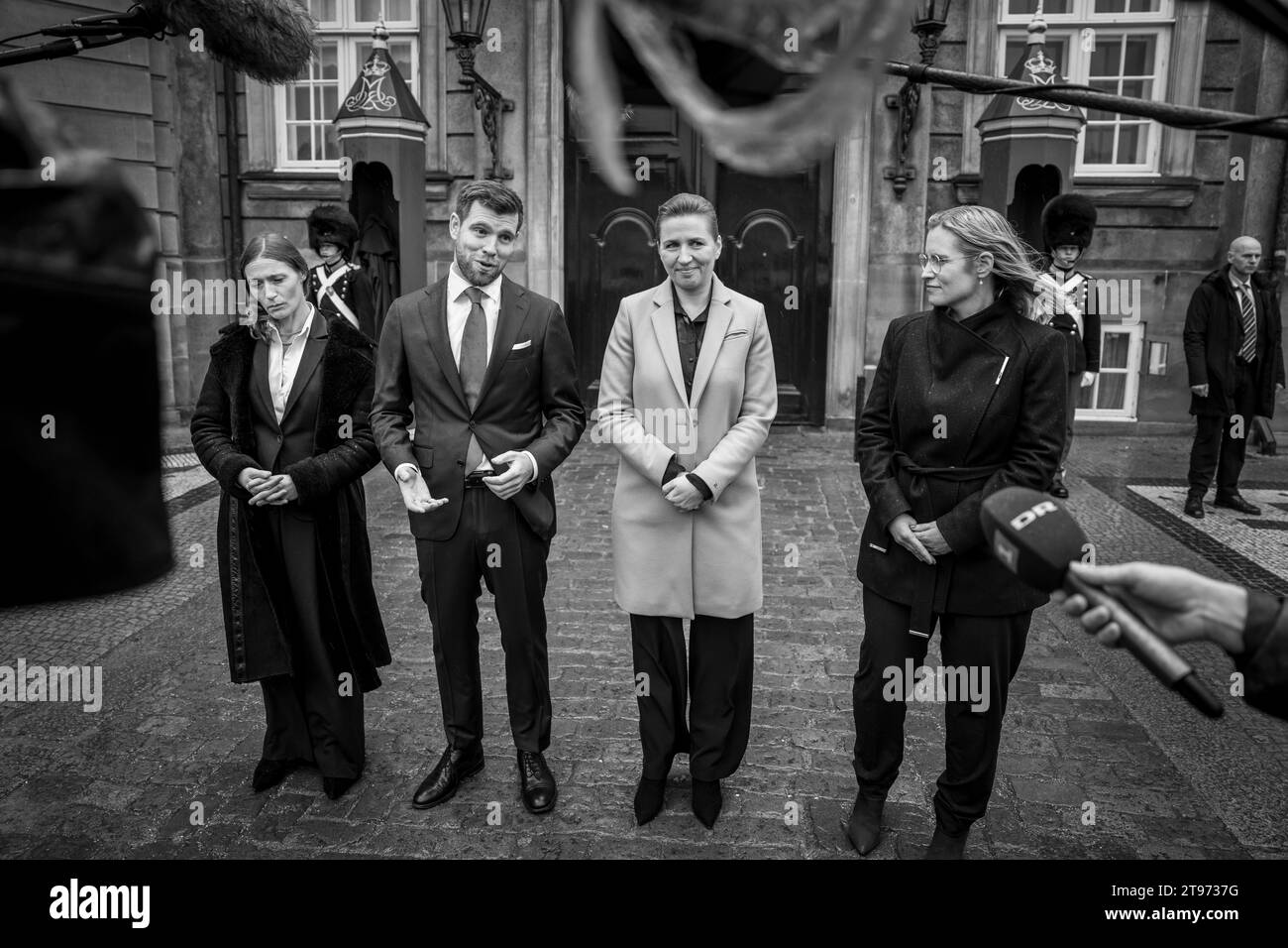 Danish Prime Minister Mette Frederiksen (second from right) presents ...