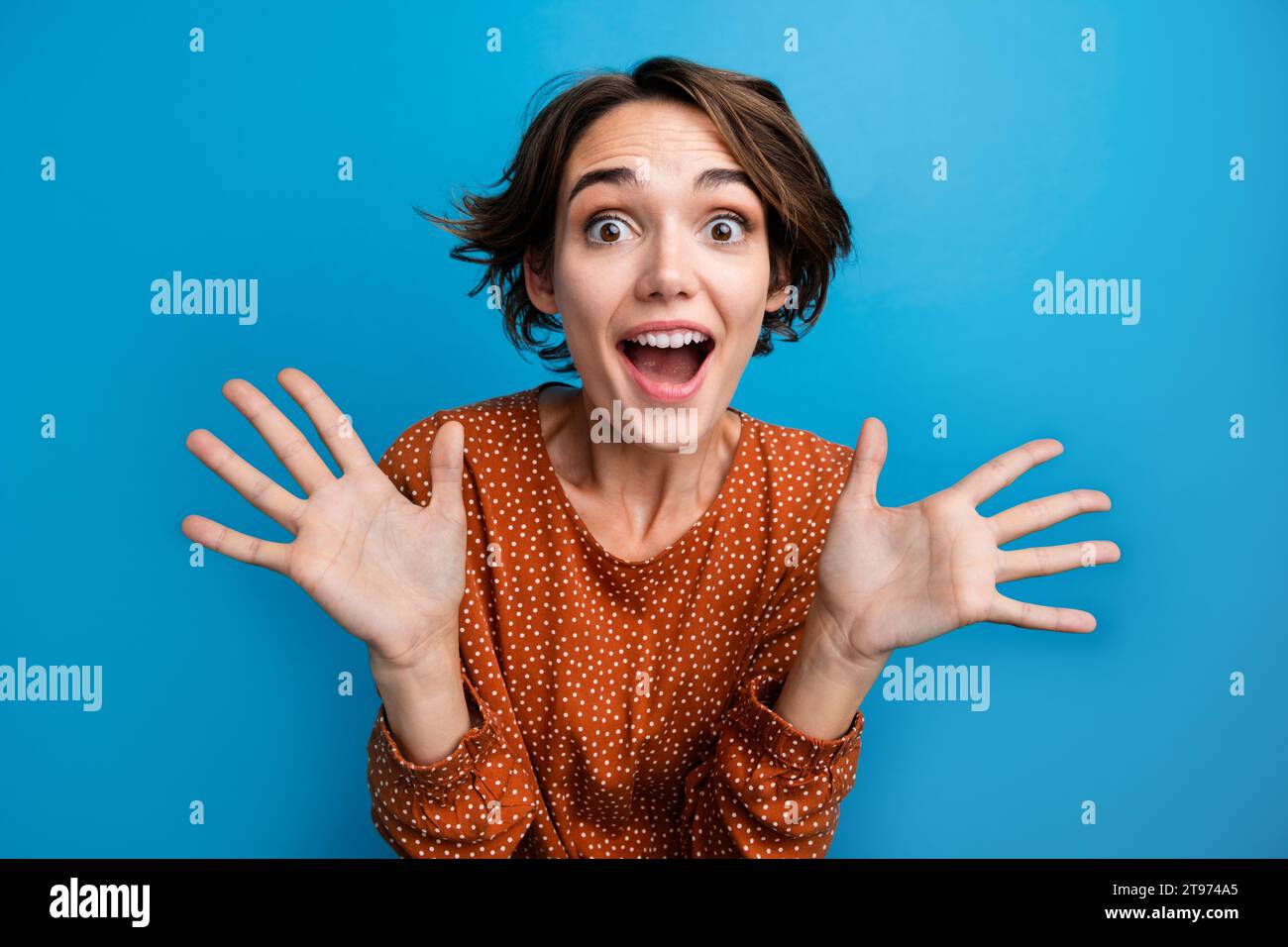 Photo of excited lady raise hands open mouth big shopping sale low ...