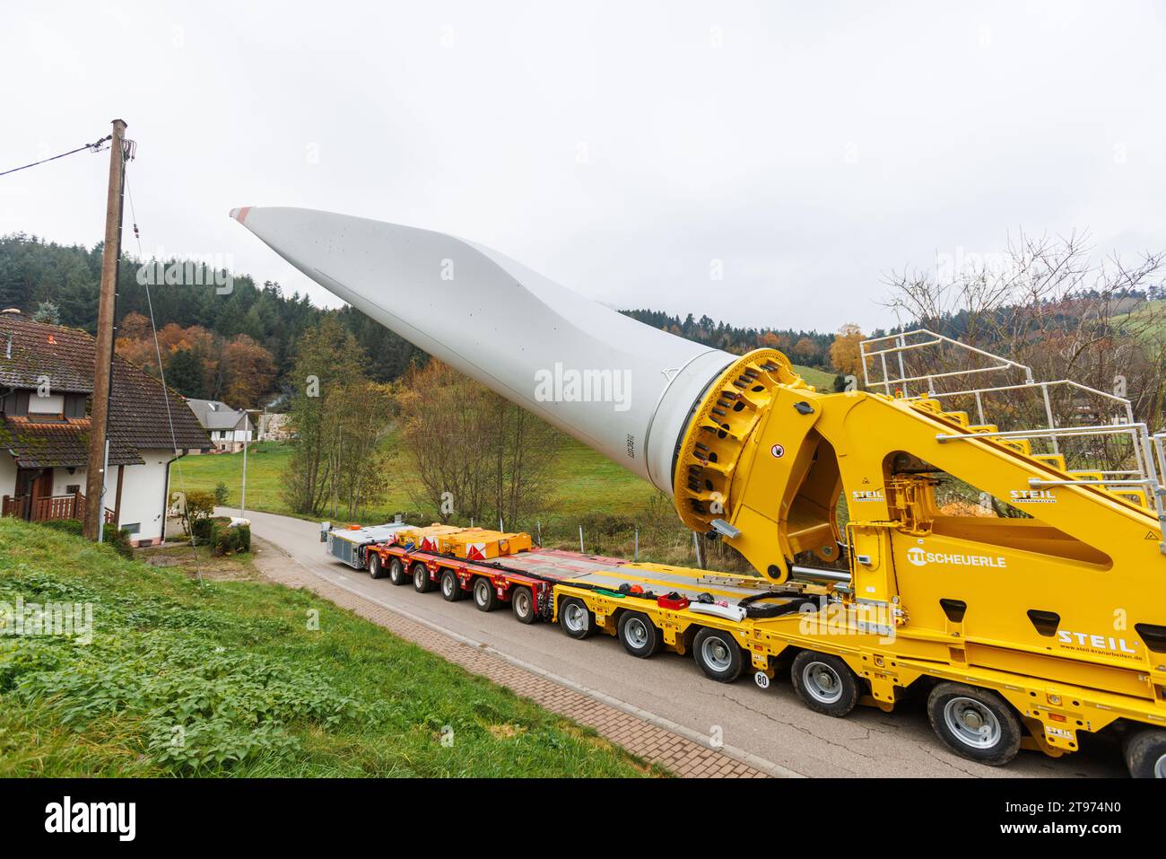 Biberach, Germany. 23rd Nov, 2023. A wind turbine blade is mounted on a ...