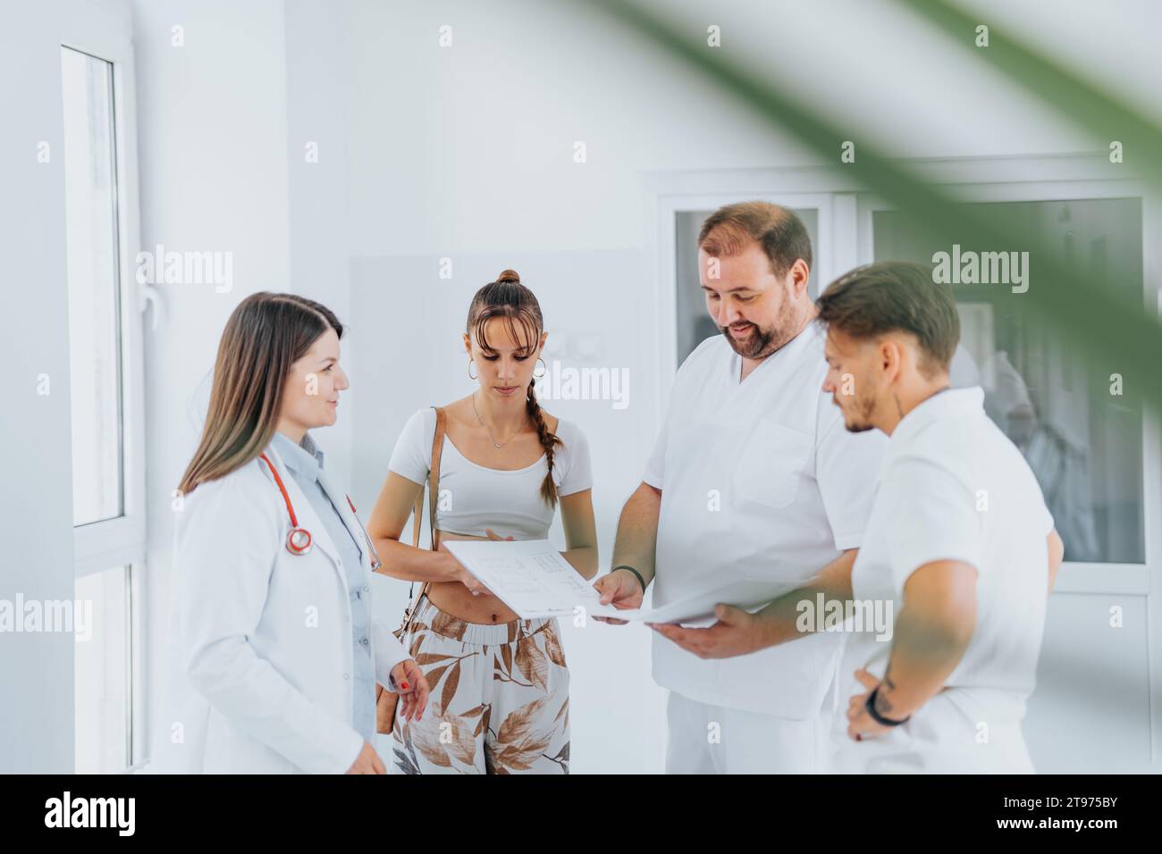 Skilled healthcare professionals analyze lab results in a busy clinic ...