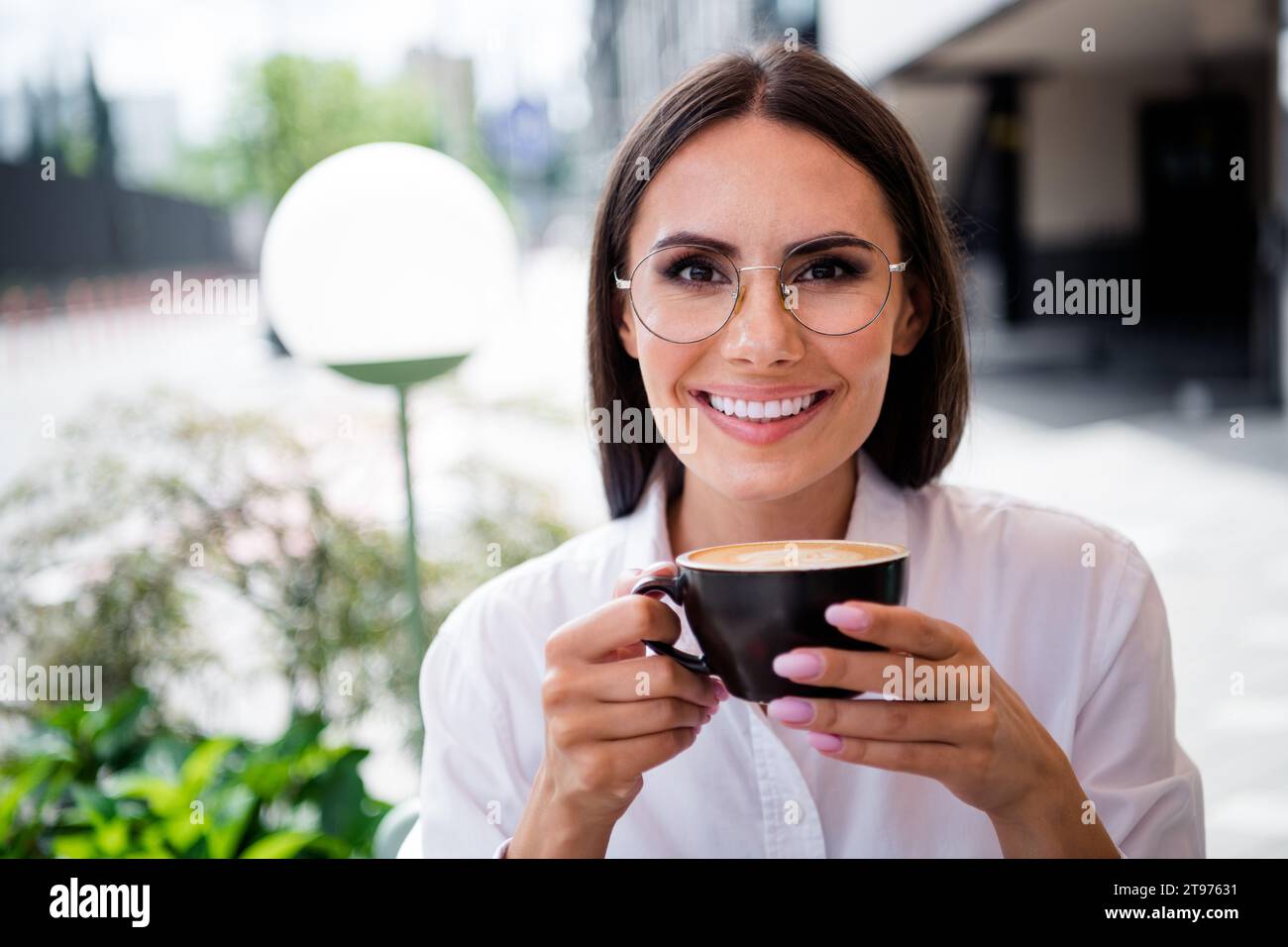 Portrait of stunning cheerful person beaming smile hands hold delicious ...