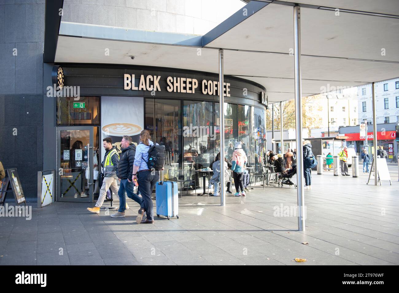 Black Sheep Coffee shop outside Kings Cross train station, many shops ...
