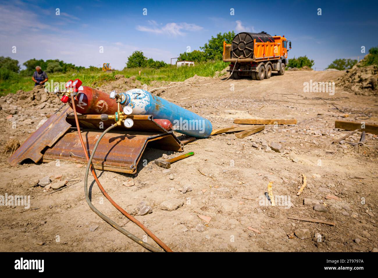 Red and blue welding equipments, oxygen and nitrogen tanks with valves ...