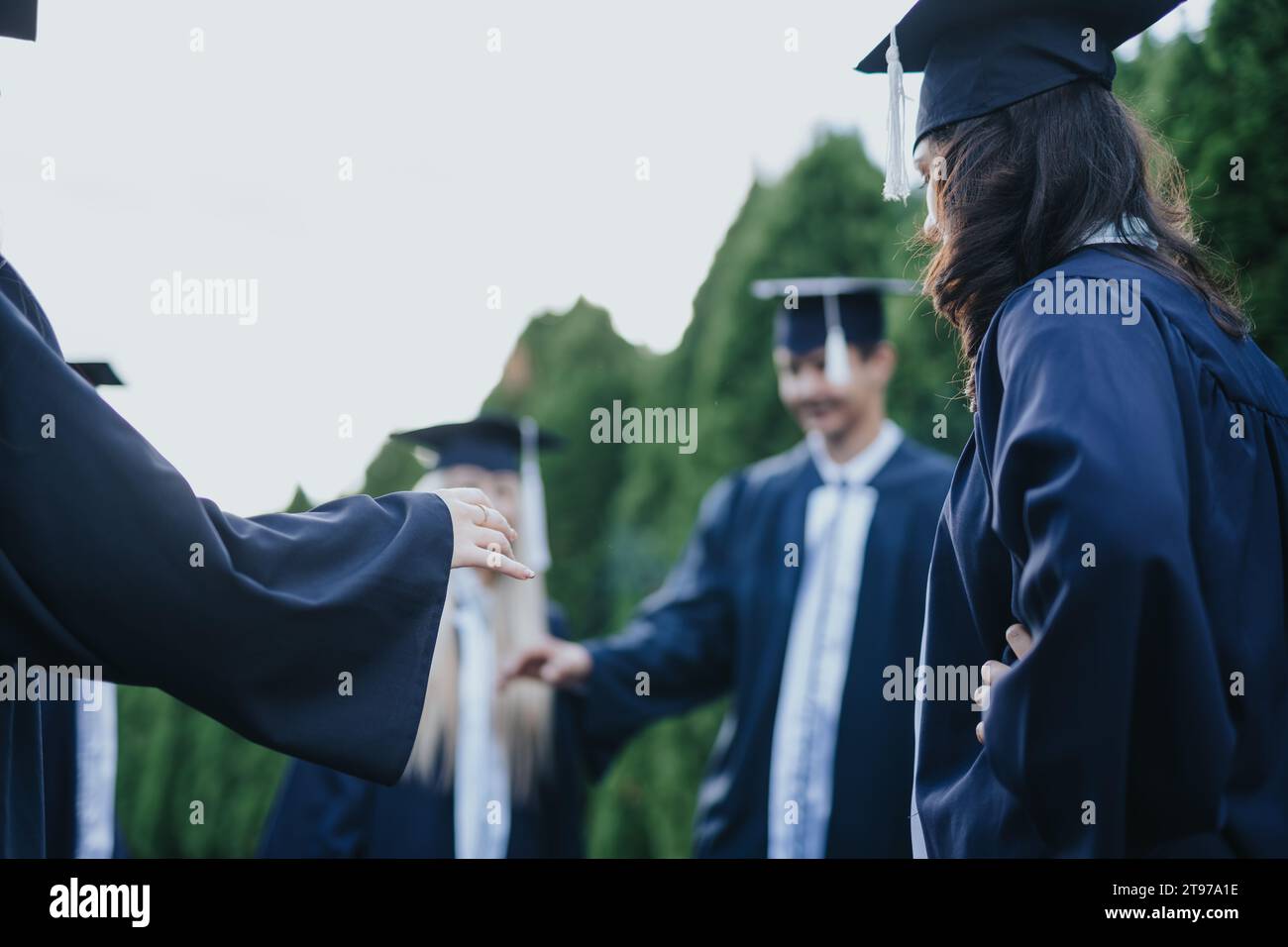 Group of University Students Celebrating Graduation and Sharing ...