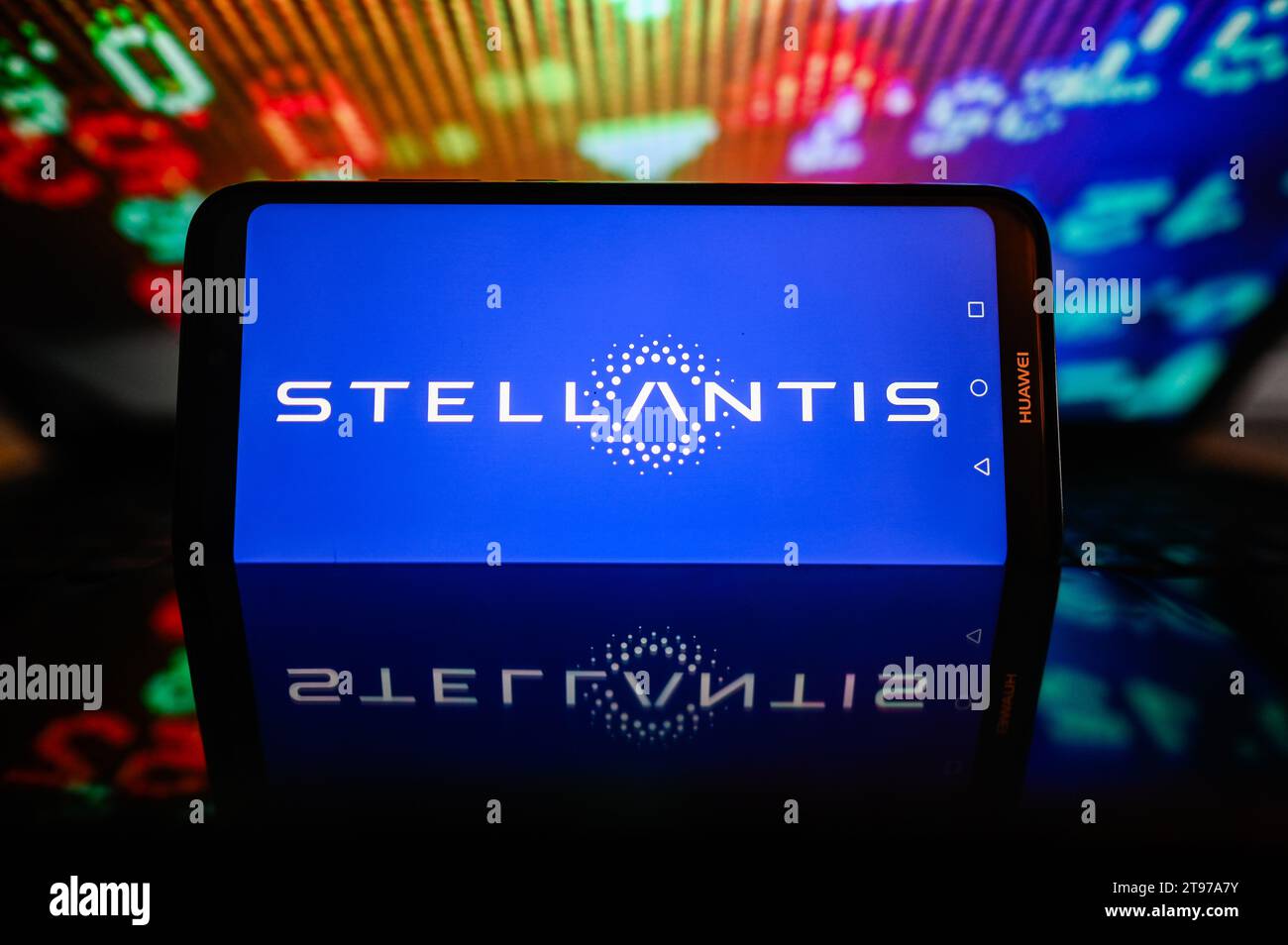 In this photo illustration, a Stellantis logo is displayed on a ...