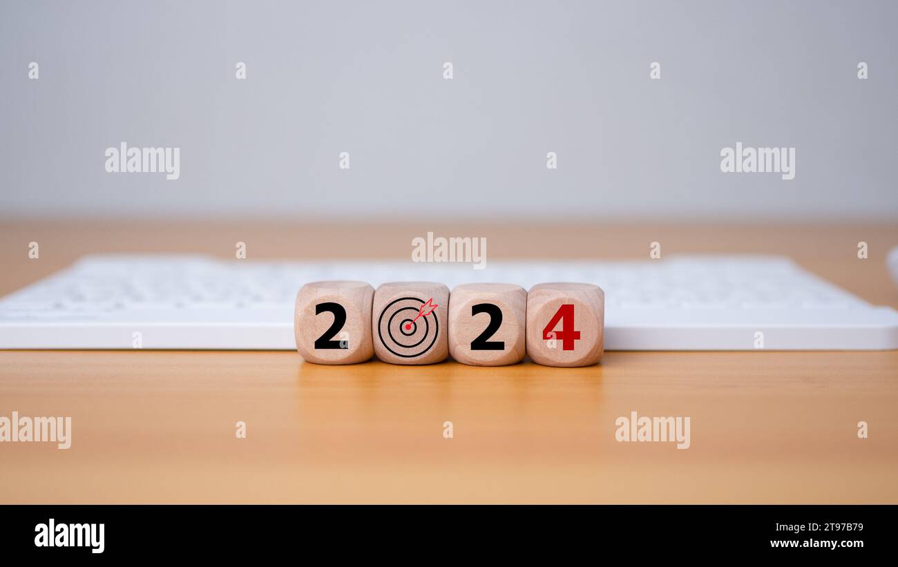 Wooden blocks line the wooden floor and bear the letters 2024 ...
