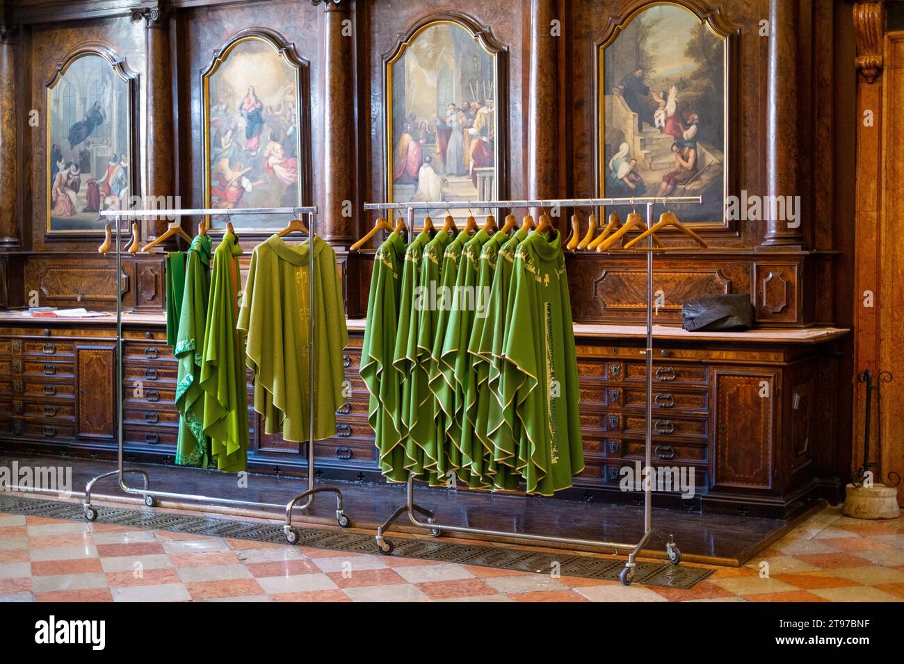 Green robe of priests during mass Stock Photo - Alamy