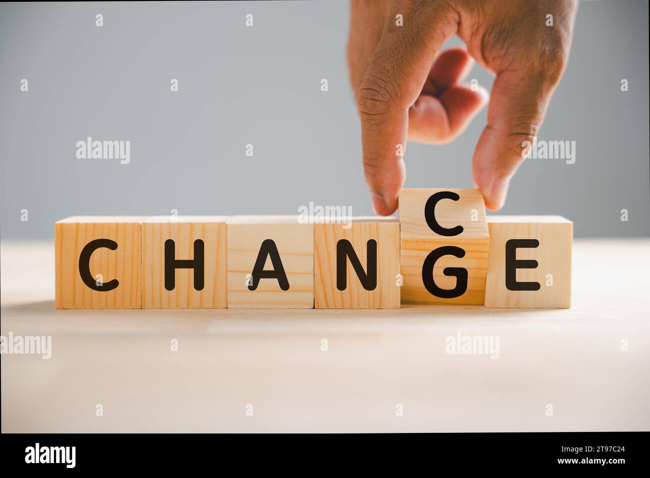Wooden cube transforms, CHANGE becomes CHANCE Stock Photo - Alamy