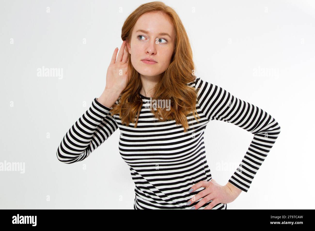 young red head woman listening gossip copy space, Young beautiful red ...