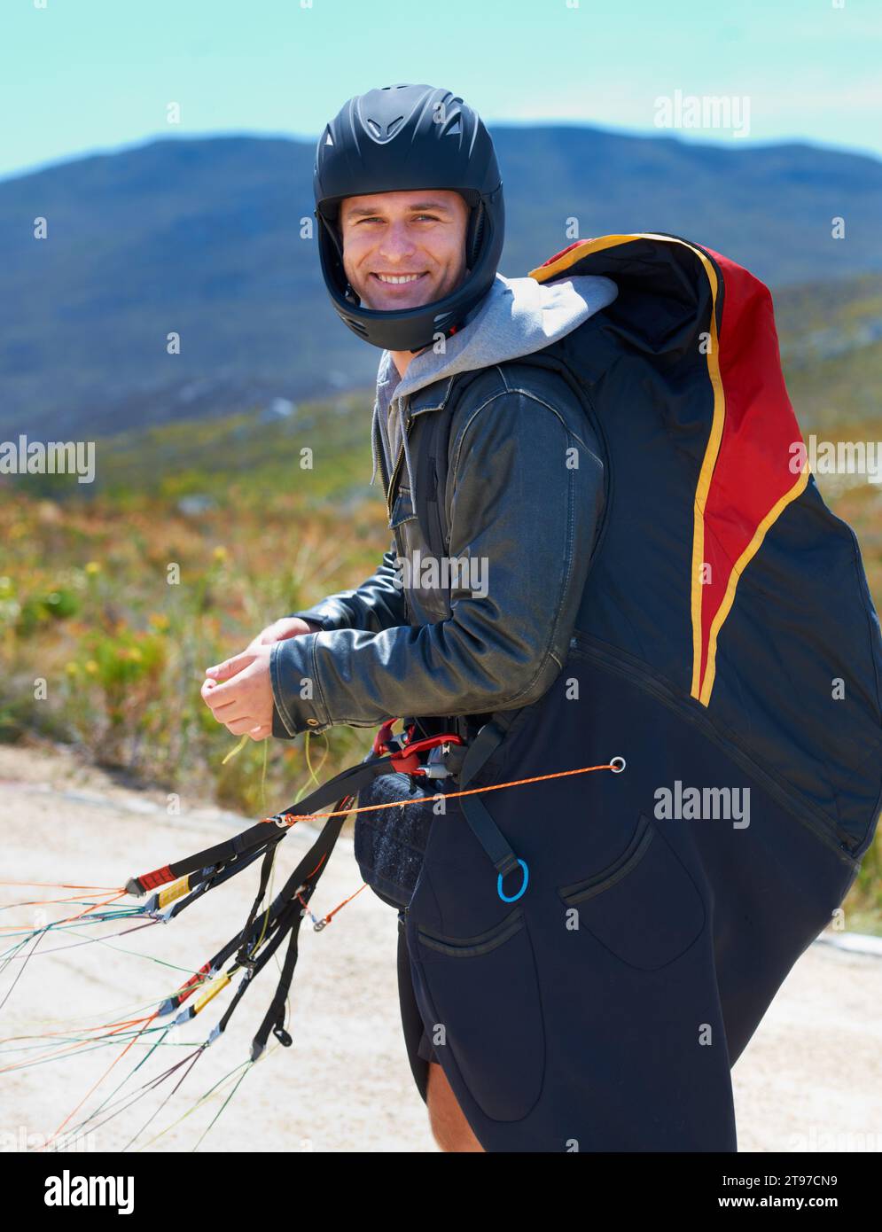 Paragliding, parachute or man in nature in portrait, smile or strings ...