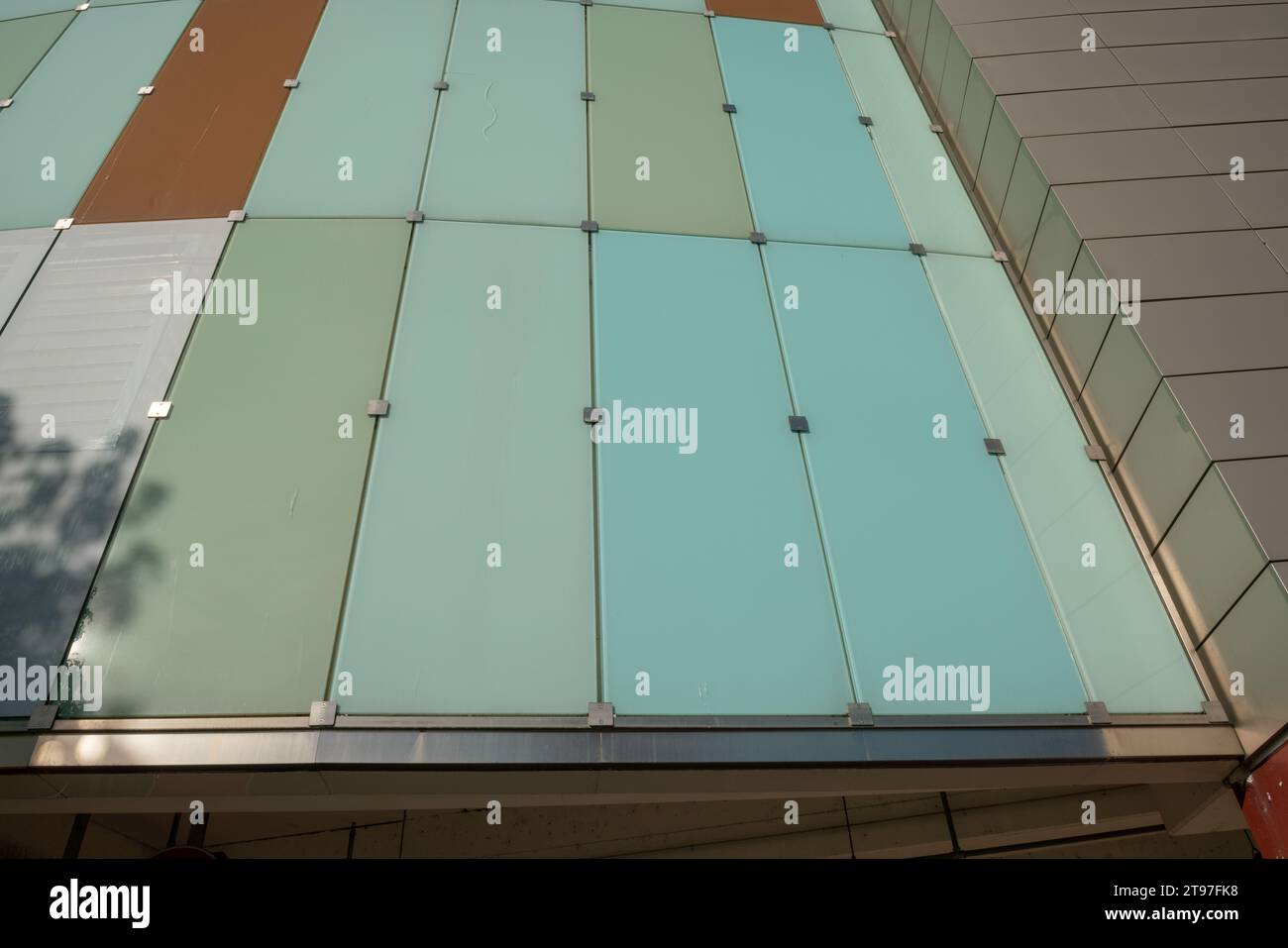 Crystal facades, modern building colored glass elements in facade ...