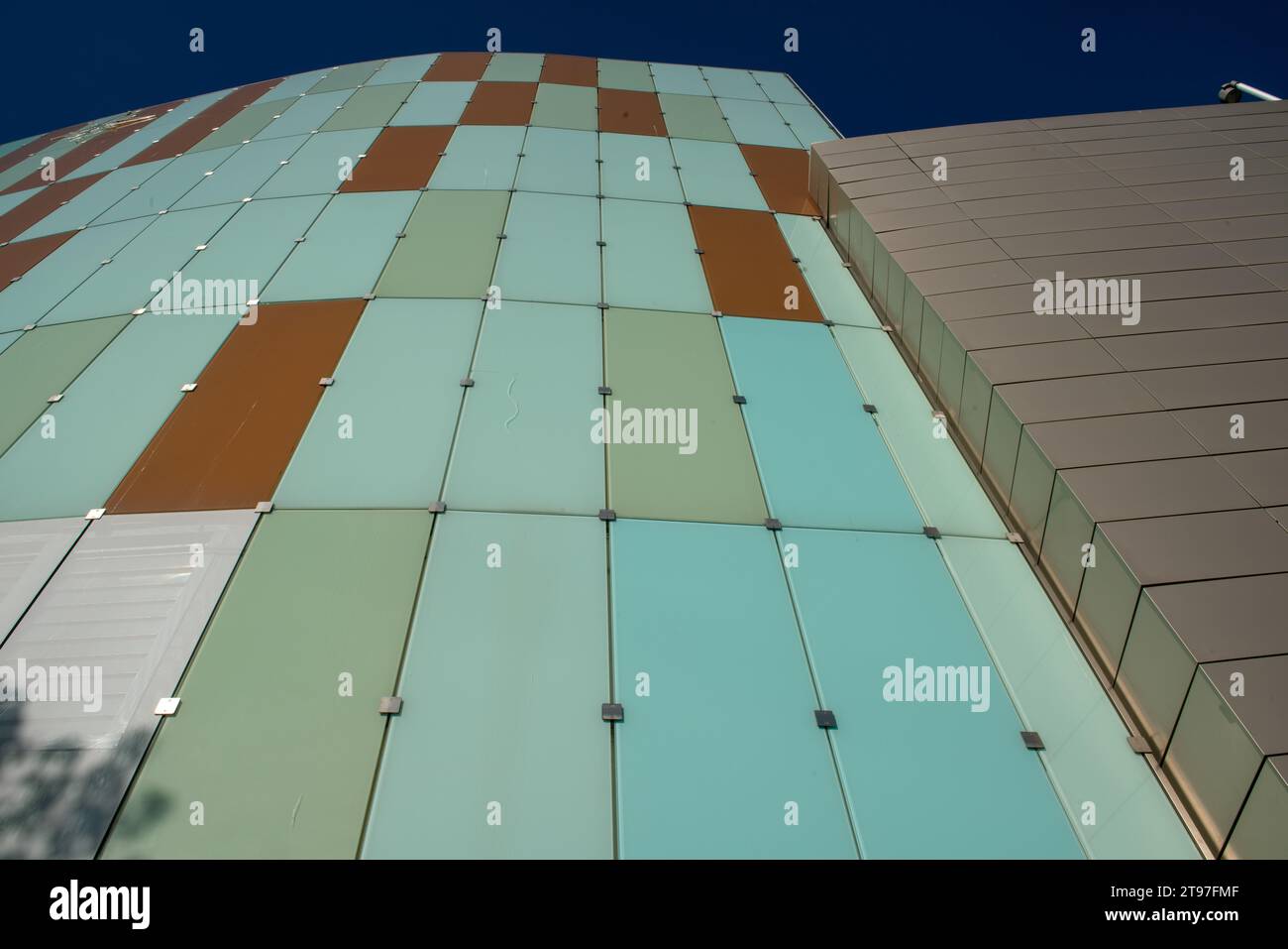 Crystal facades, modern building colored glass elements in facade ...