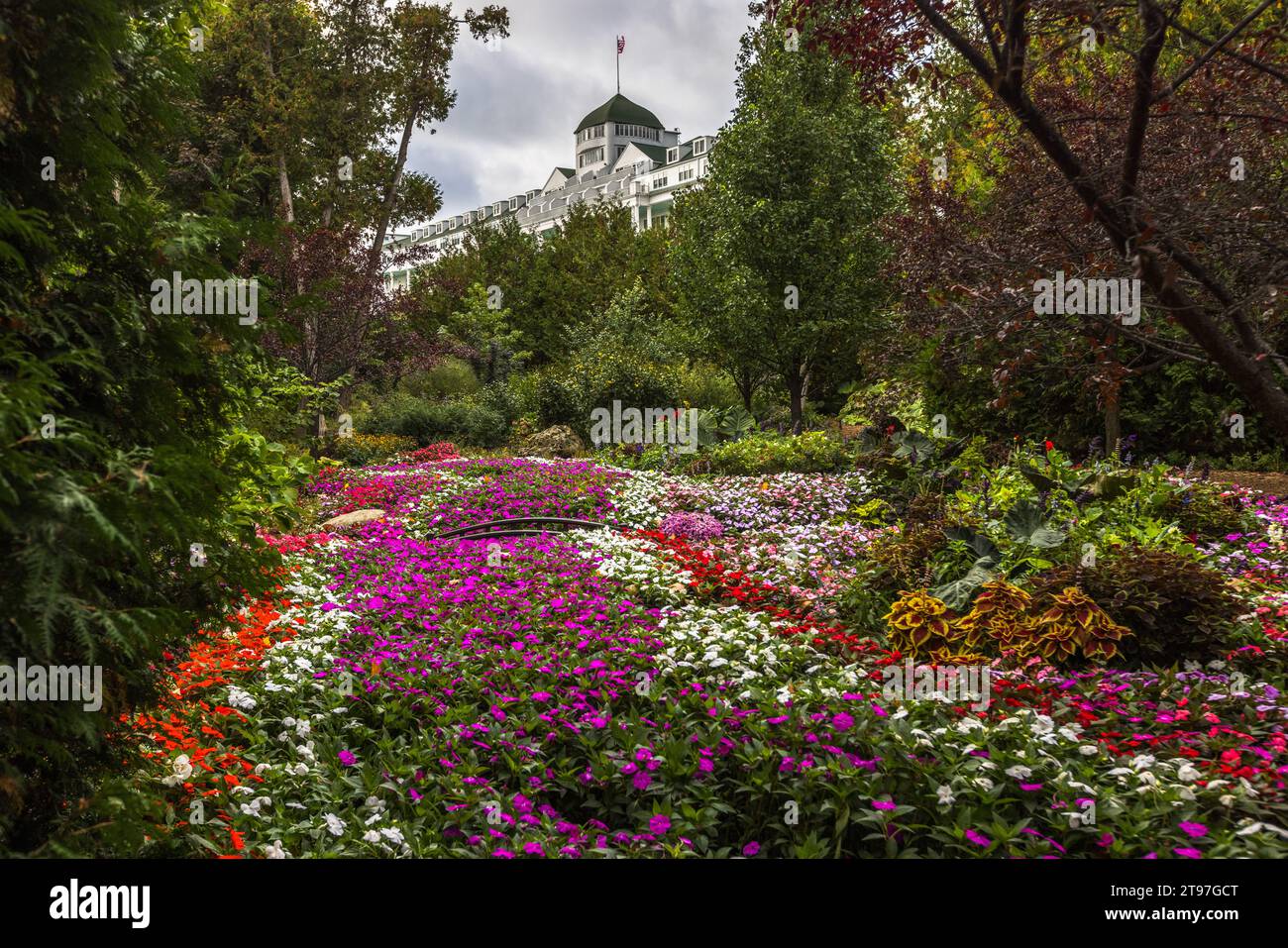 Hidden flower garden in the grounds of the Grand Hotel, Mackinac Island ...