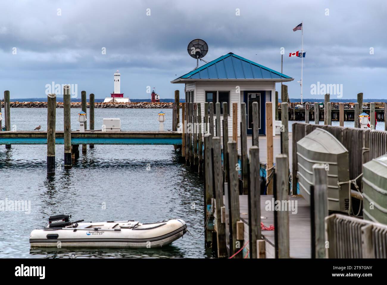 Haldimand Bay jetty, Mackinac Island with lighthouse. Lighthouse off ...