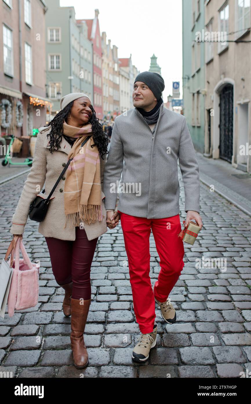 Mature couple holding present hi-res stock photography and images - Alamy