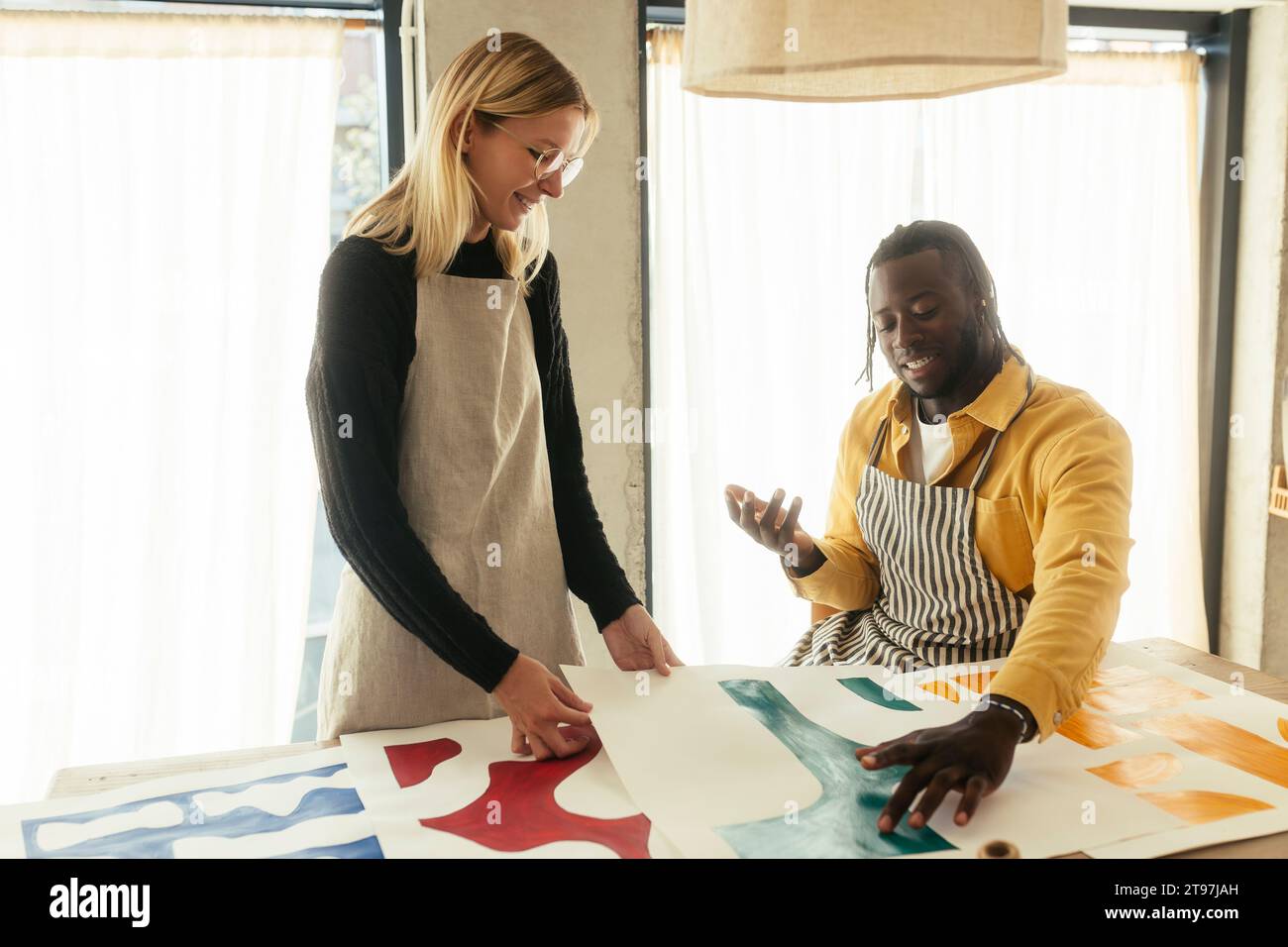 Artist showing his paintings hi-res stock photography and images - Alamy