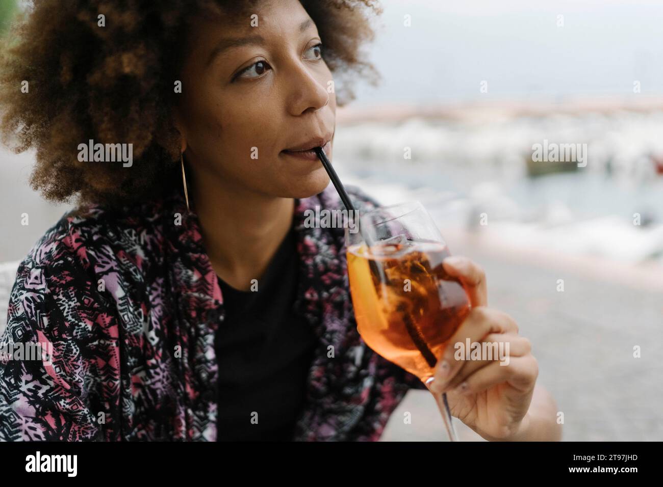 Woman drinking aperol spritz hi-res stock photography and images - Alamy
