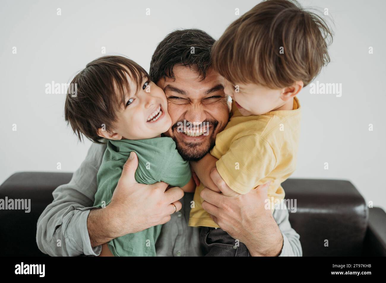 Cheerful boy in white hi-res stock photography and images - Alamy