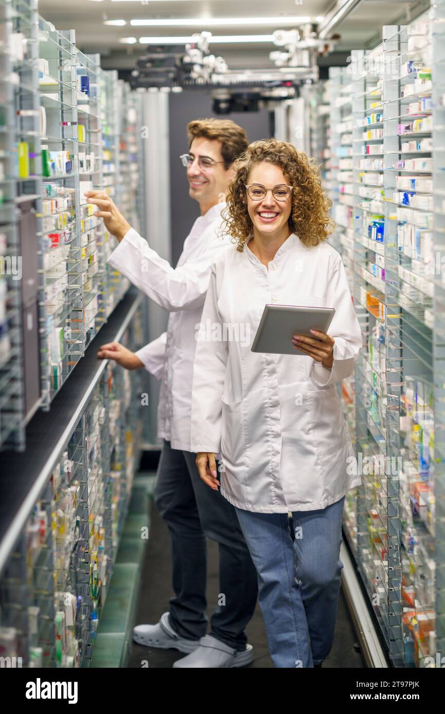 Female pharmacist taking inventory hi-res stock photography and images ...