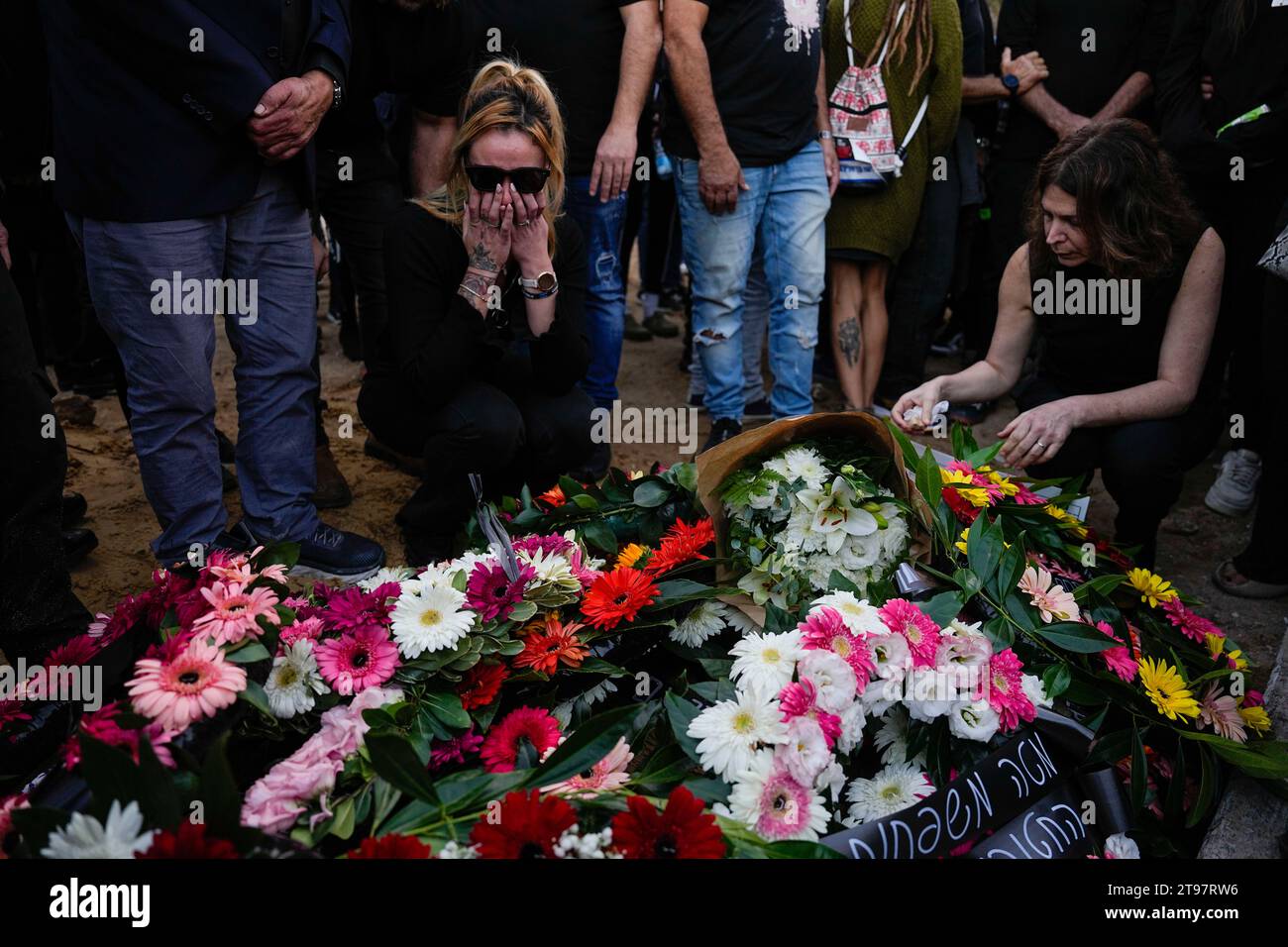 Mourners gather in grief during the funeral of Shani Gabay in the ...