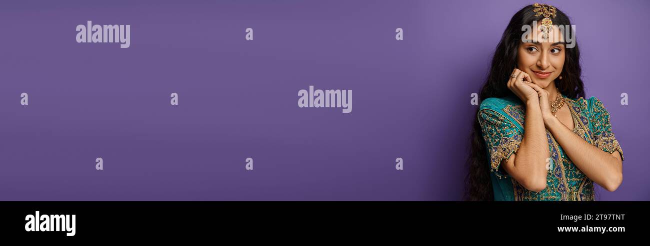 jolly indian woman in national costume with accessories posing on ...