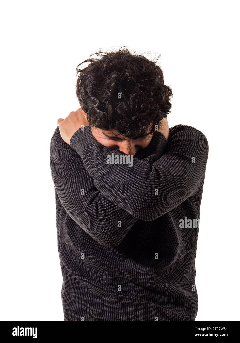 A man with his head in his hands Stock Photo - Alamy