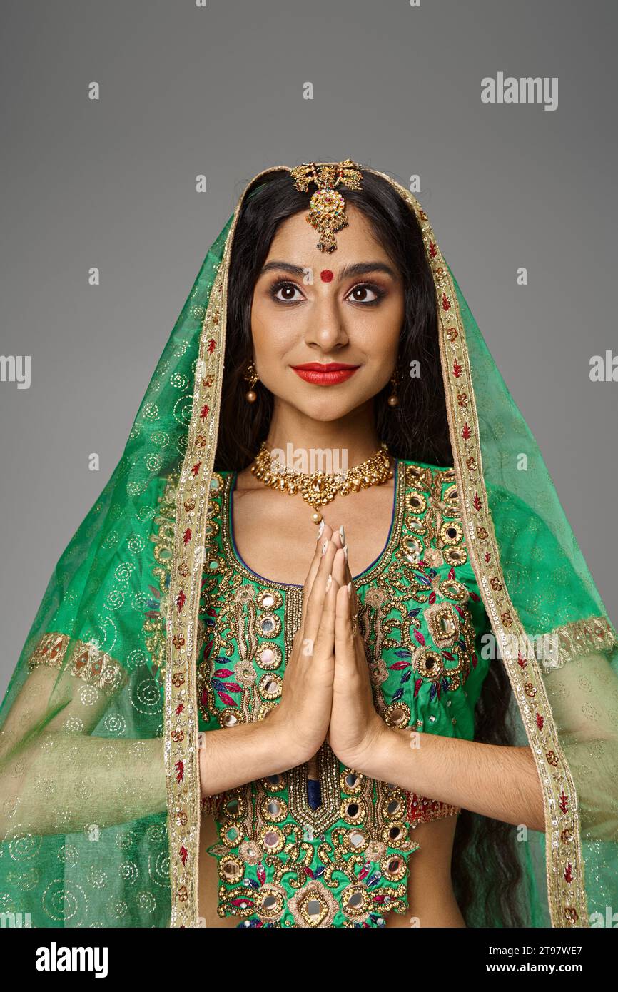 attractive indian female model with bindi dot on forehead and green ...