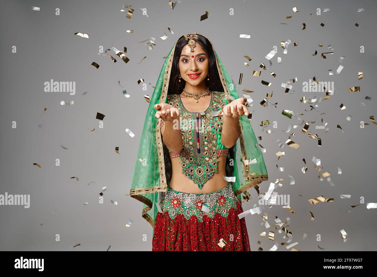 beautiful indian woman in national clothes with bindi showing open ...
