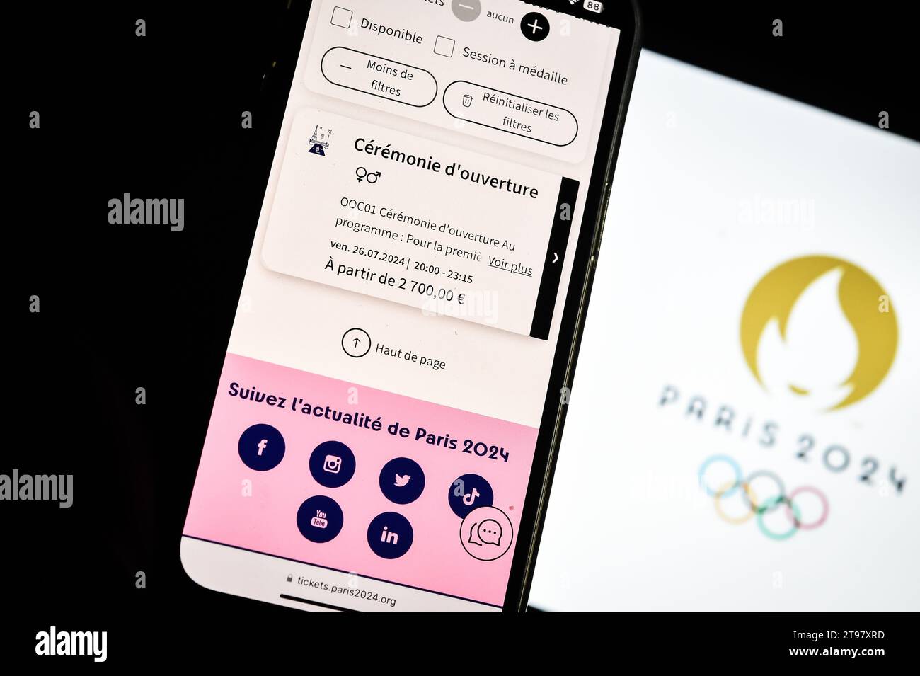 This picture shows a person going to the official website of the Paris ...