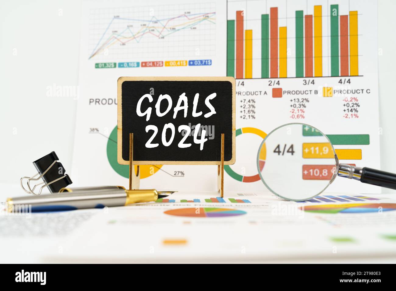 Business concept. Against the background of business graphs, a board ...