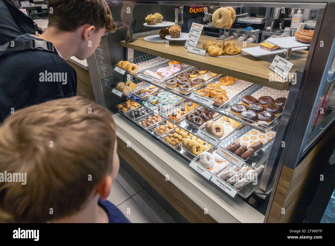 Boys choosing donuts at Dunkin Donuts, New York City, United States of ...
