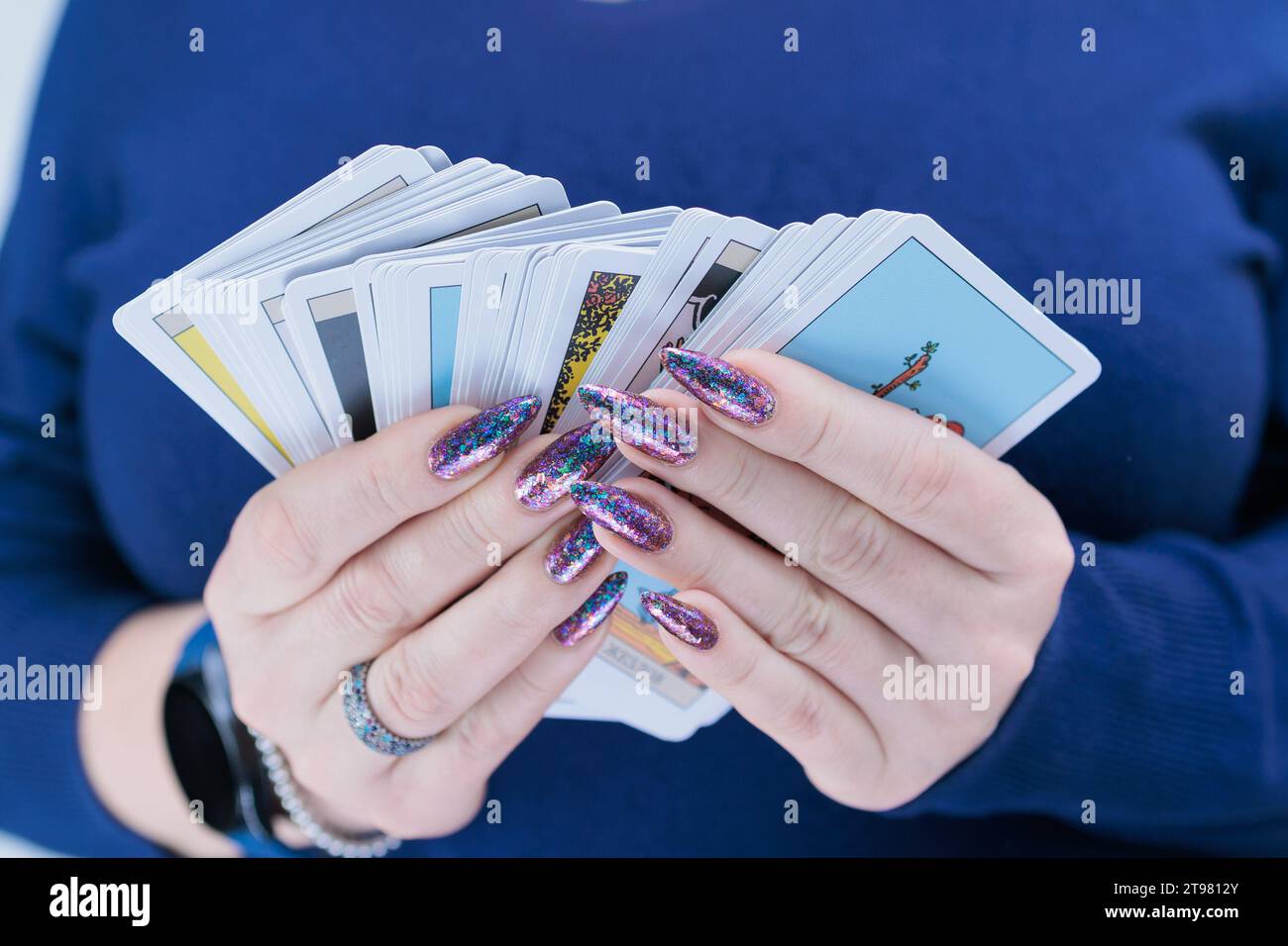 Female hands holding tarot cards for fortune telling and tricks Stock ...