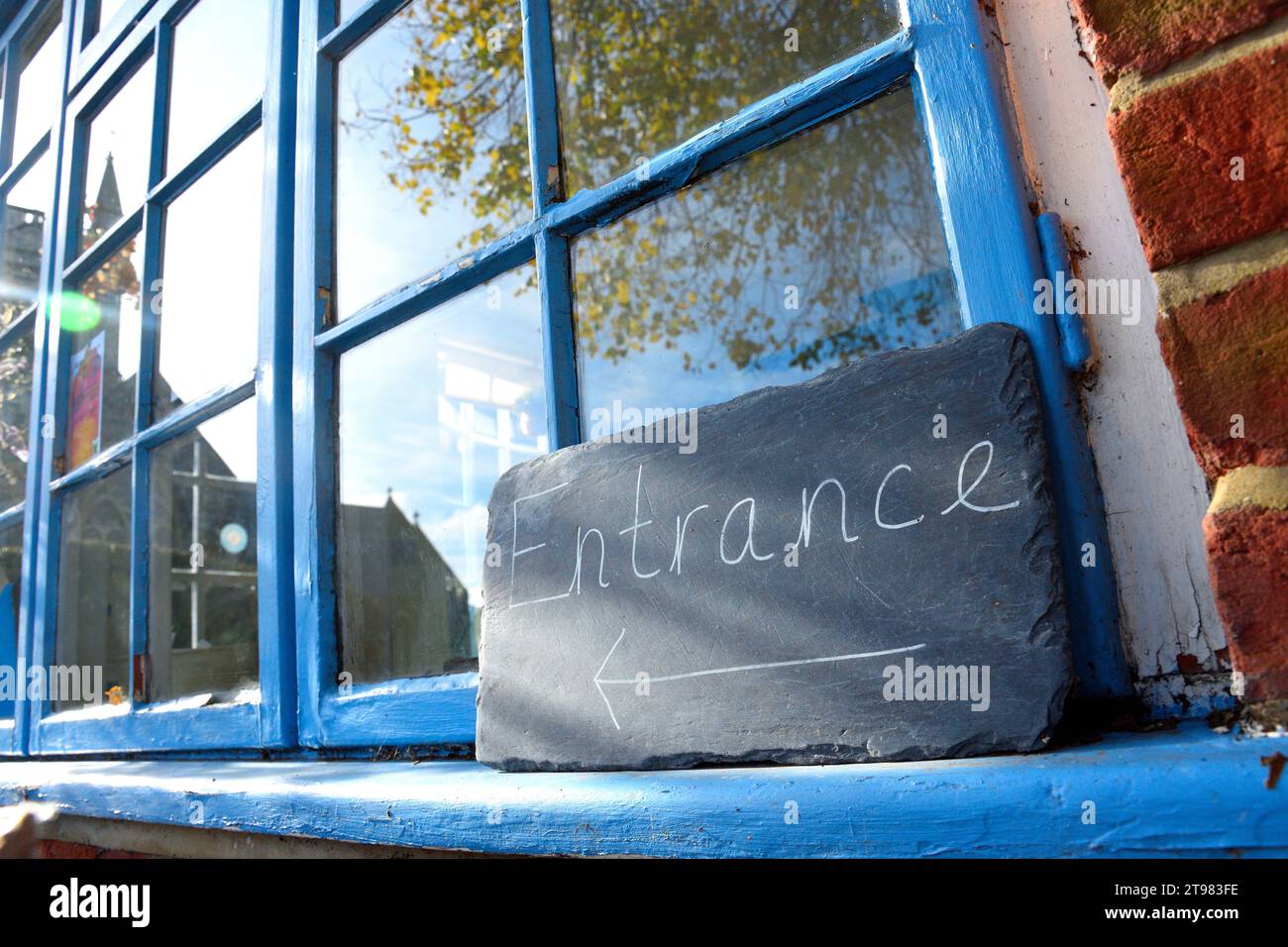 Entrance sign hand written on slate stone Stock Photo - Alamy