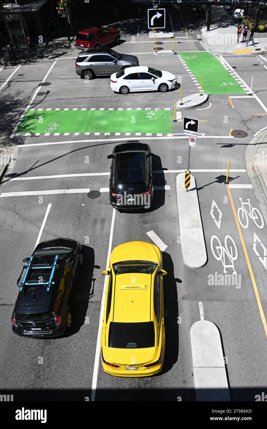 Cars go through intersection in hi-res stock photography and images - Alamy