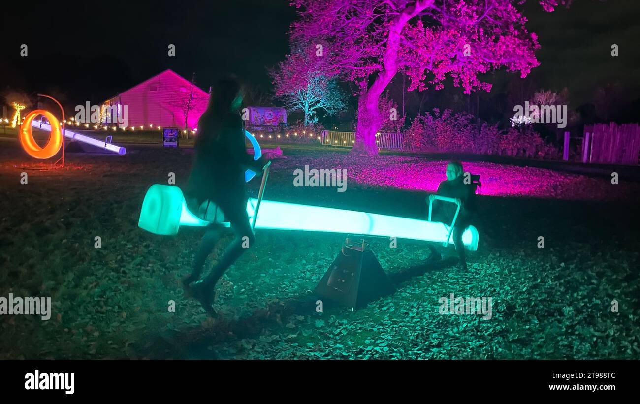 People enjoying the glowing see saws at Marwell Zoo's Glow Marwell ...