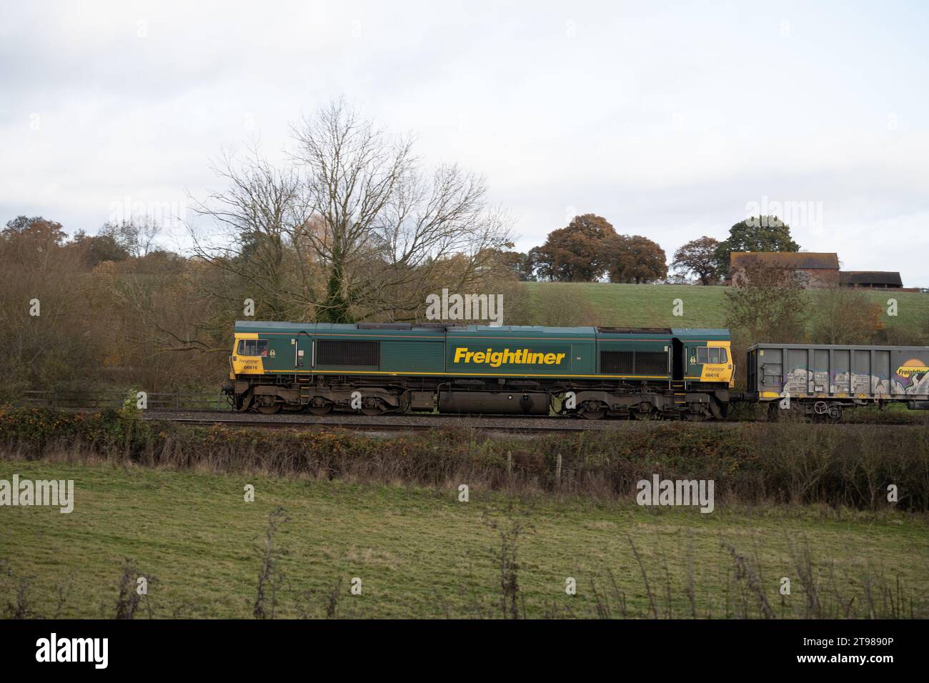 Freightliner Class 66 diesel locomotive No. 66616 pulling a freight ...