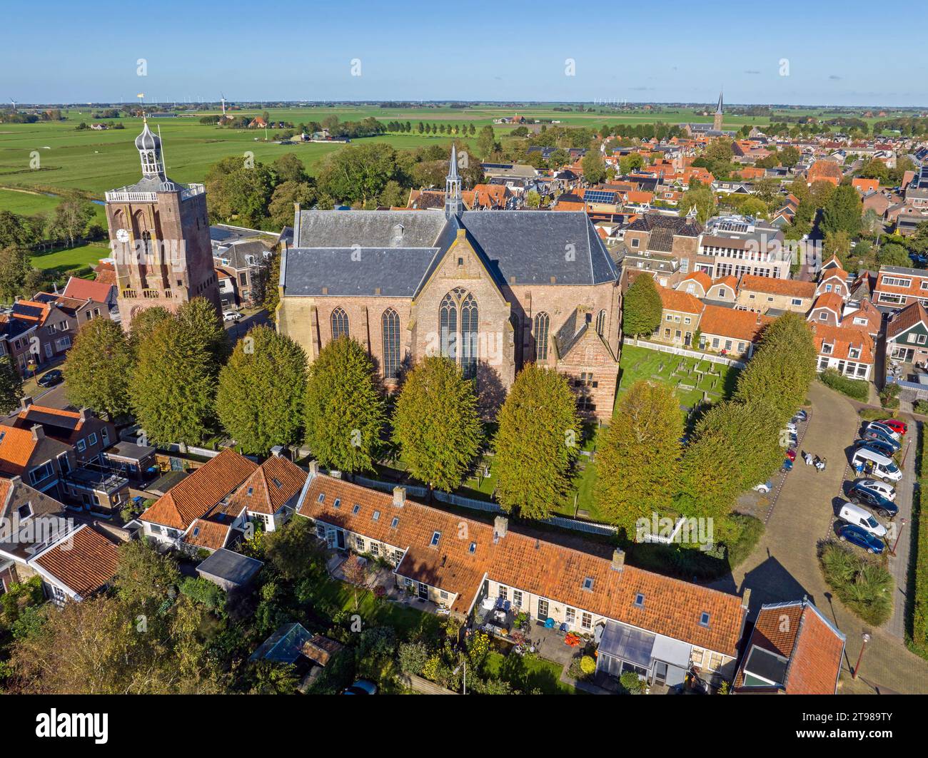 Aerial from the historical city Workum with the St Gertrudis church in ...