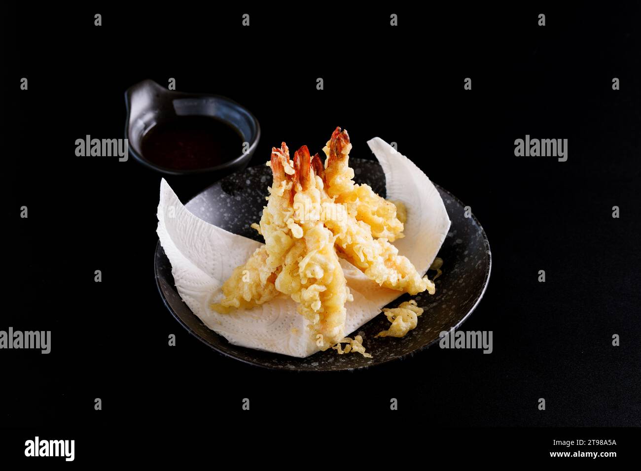 Shrimp tempura Japanese food isolated on a black background Stock Photo ...