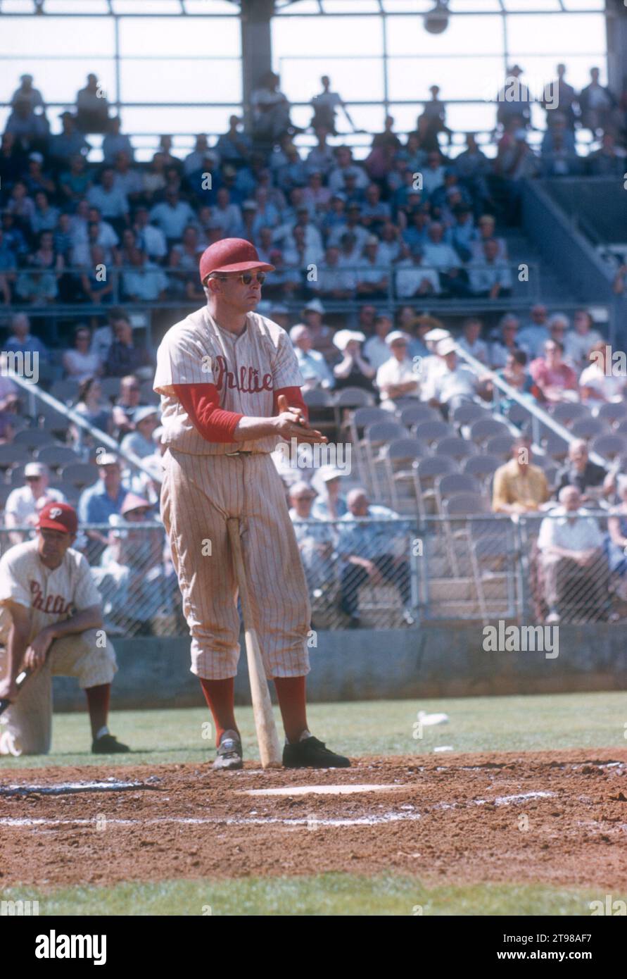 FL - MARCH, 1956: Del Ennis #14 of the Philadelphia Phillies wipes dirt ...
