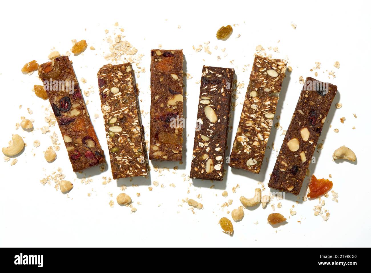 Healthy vegan bars with dried fruits and nuts on a white background ...