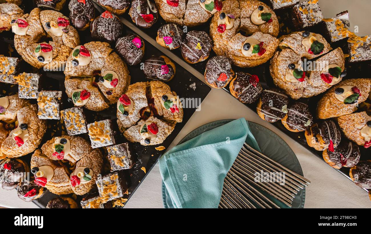 Delicious, table with various sweets Stock Photo - Alamy