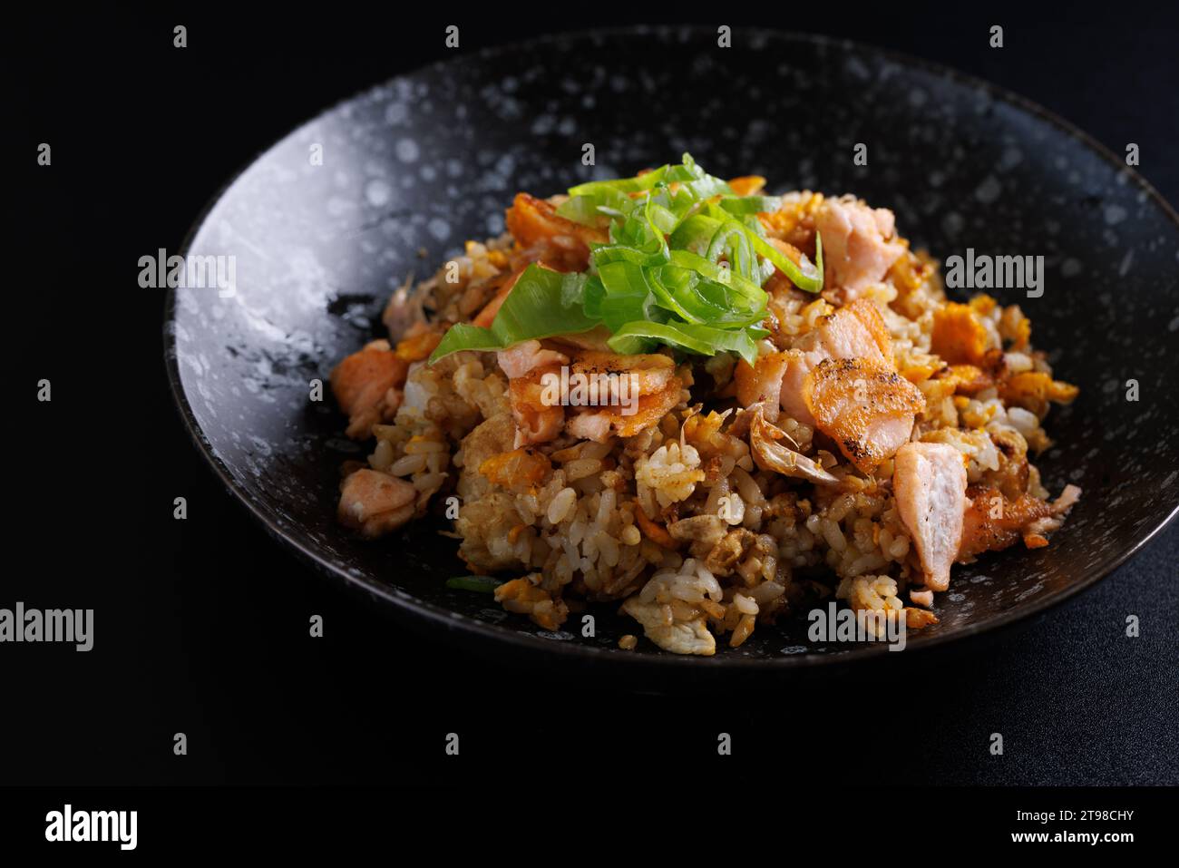 Japanese fried rice yakimeshi isolated in black background Stock Photo ...