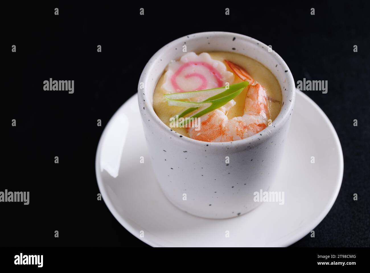 Japanese Traditional food Eggs Custard Chawanmushi isolated in black ...