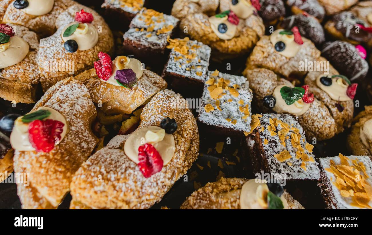 Delicious, table with various sweets Stock Photo - Alamy