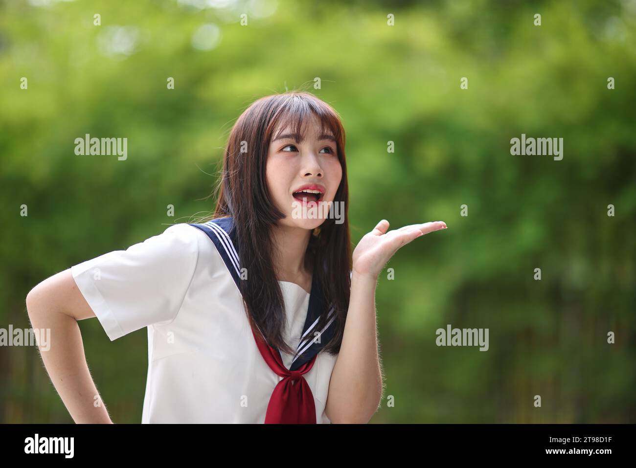 Japanese high school student with happy and shouting on copy space in ...