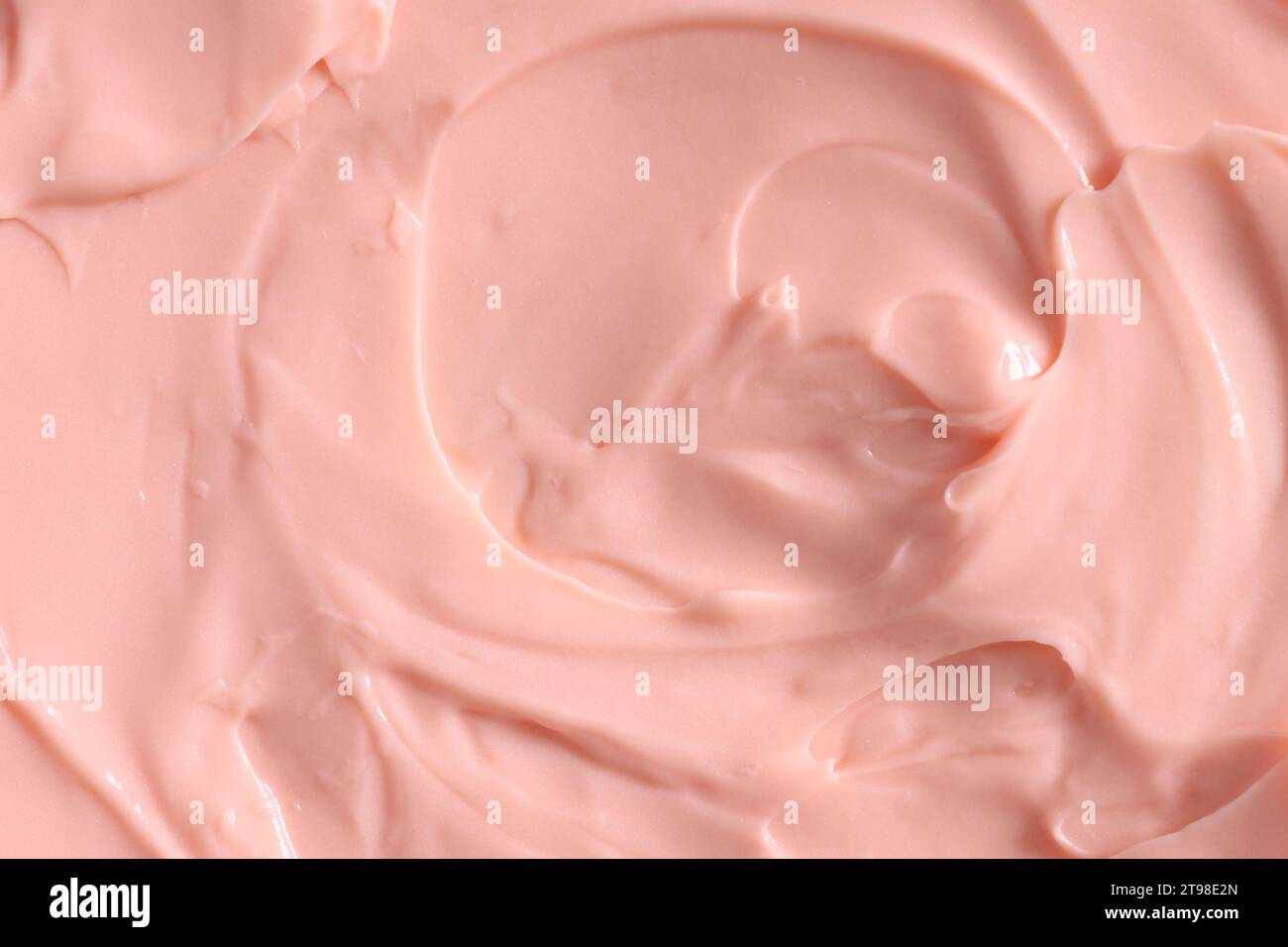 Pink skin care cosmetic beauty cream texture background in close up ...